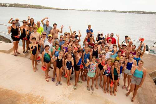 More than 300 swimmers brave tough conditions in Round the Sound Swim ...