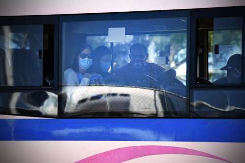 Delta charter flight returns 104 residents - The Royal Gazette ...