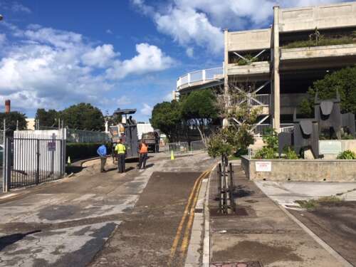 Cars backed up after paving work closes one Bull’s Head entrance - The ...