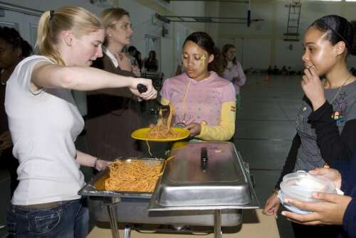 BHS girls learn about poverty at 'hunger banquet' - The Royal Gazette ...